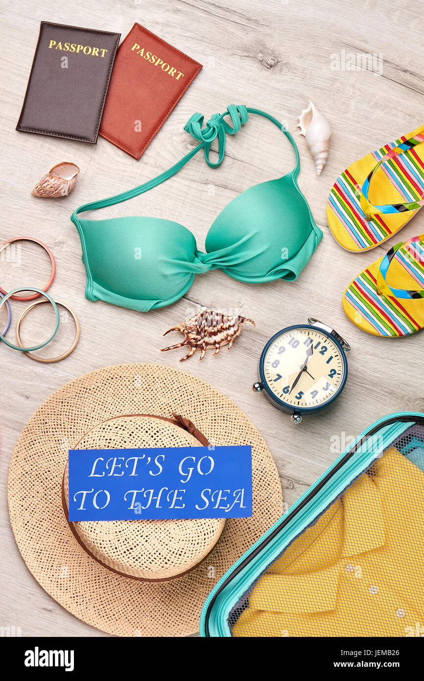 Collection of beach clothing, top view. Fashionable accessories for ...