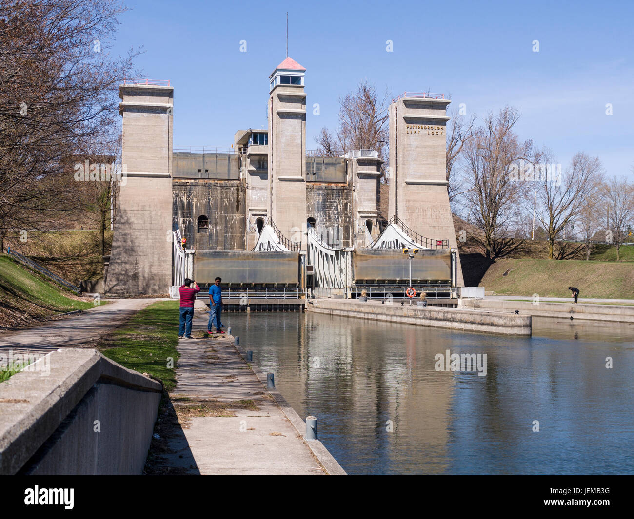 Peterborough Lift Locks on the Trent: A tourist photographs another in ...