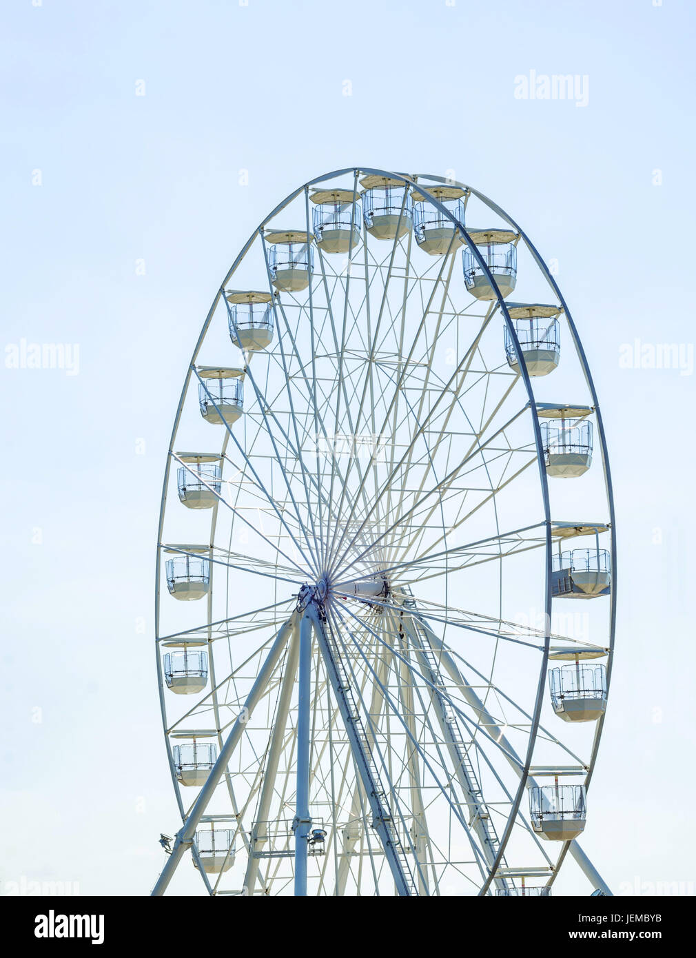 big wheel in the seaside village, in the background clean blue sky ...