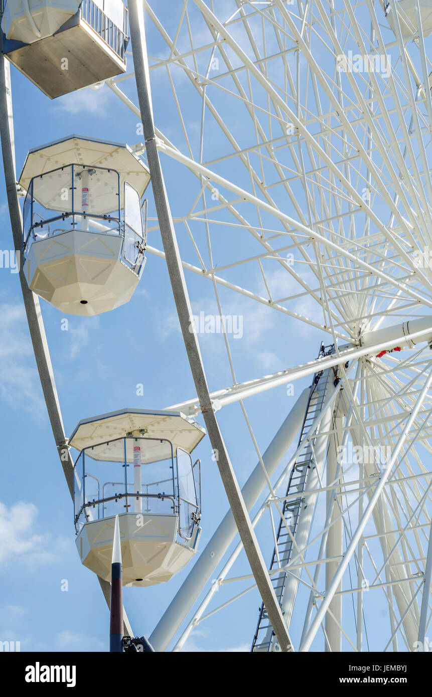 big wheel in the seaside village, in the background clean blue sky ...
