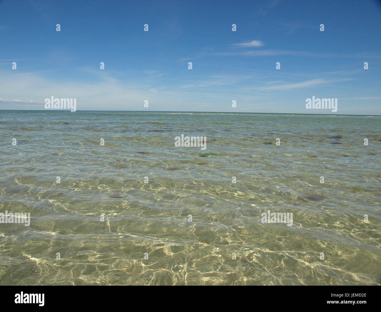 A photo of small waves on the beach in Cape Cod Stock Photo - Alamy