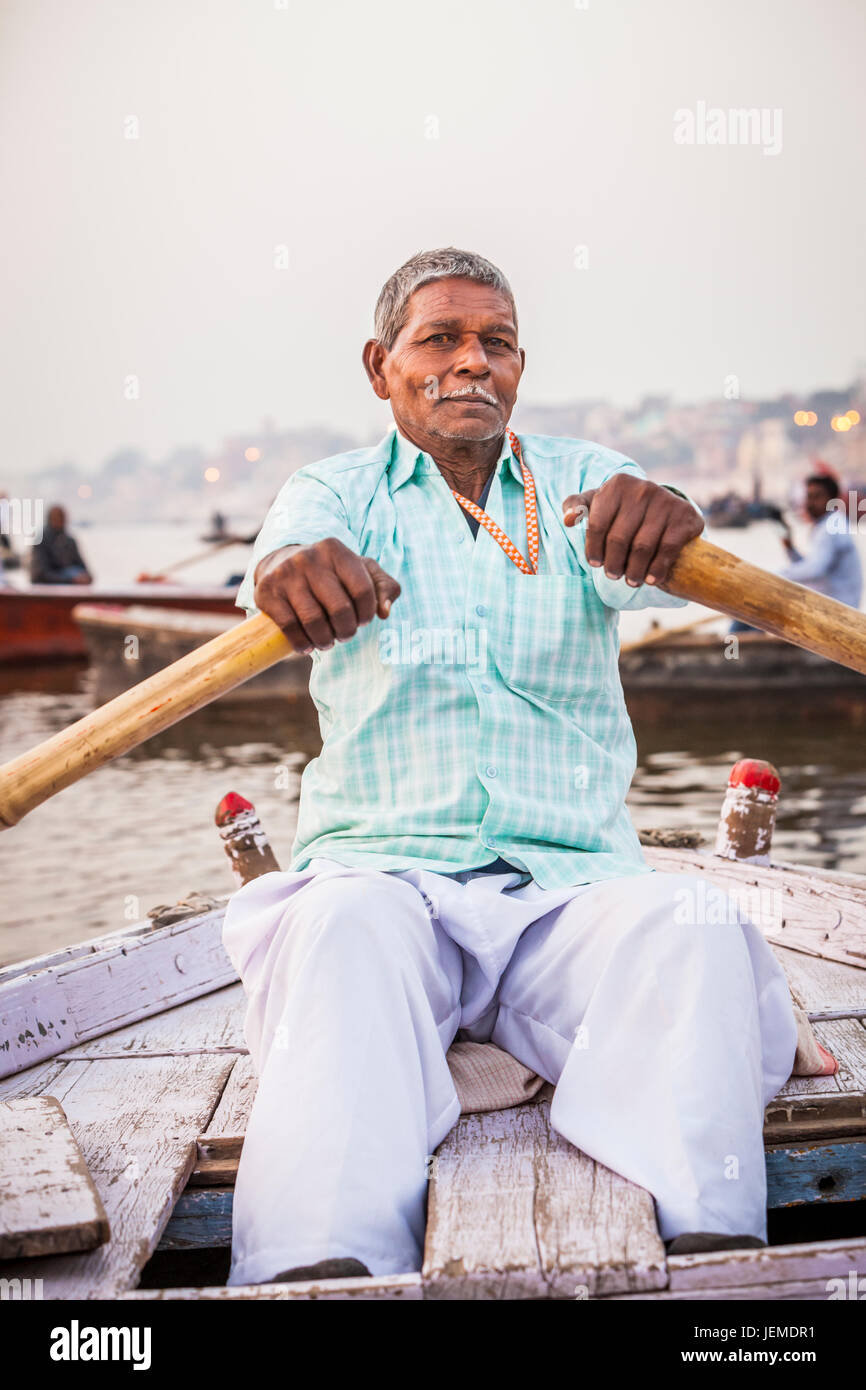 Indian man boatman rowing boat hi-res stock photography and images - Alamy