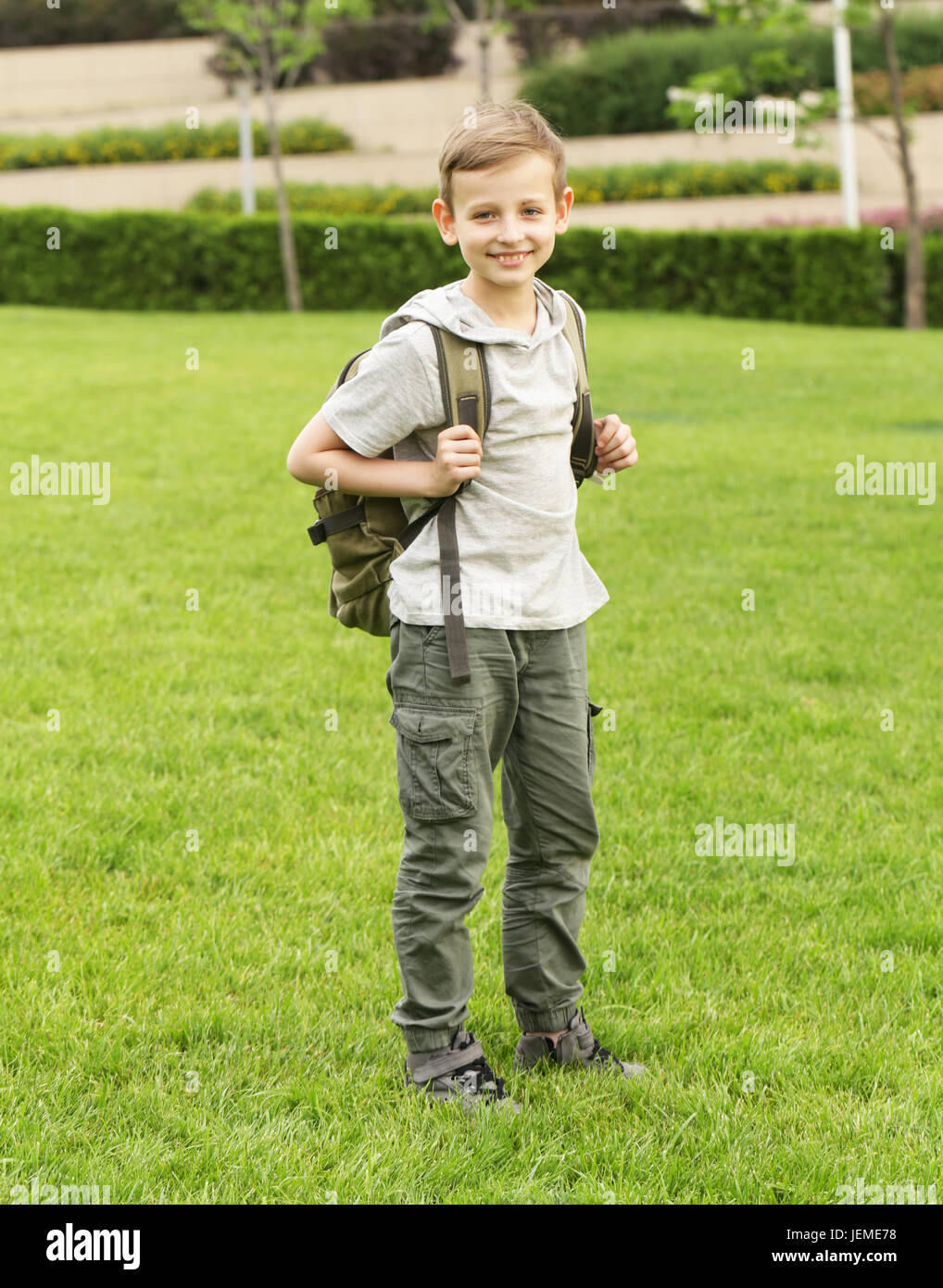 Boy with a backpack ready for adventure and travel Stock Photo - Alamy
