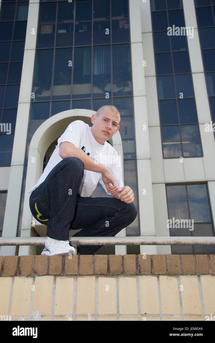 A young men in an urban location Stock Photo - Alamy