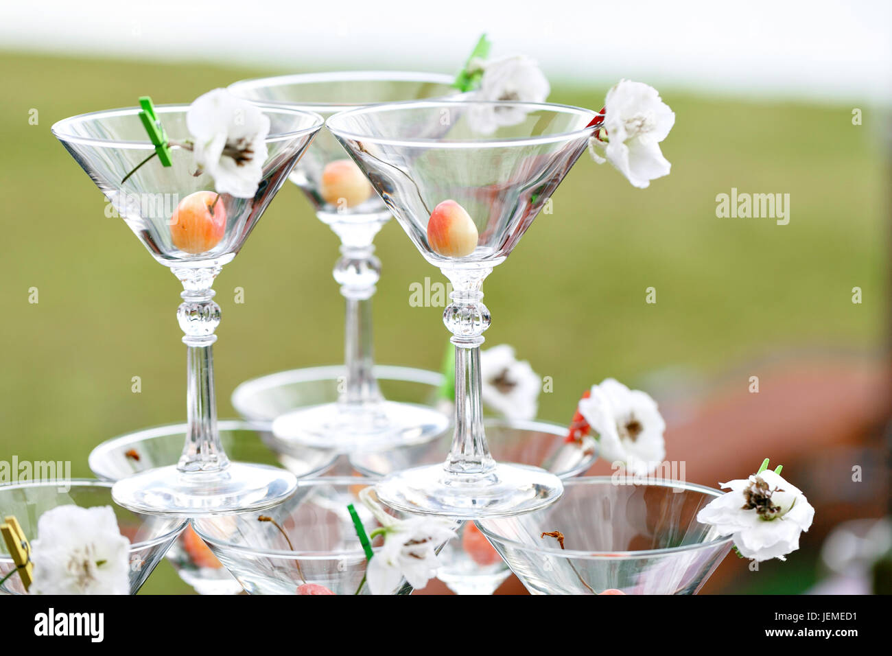 Champagne tower ready to spill alcohol Stock Photo - Alamy