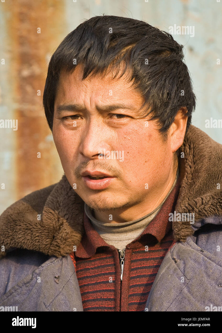 Portrait of a migrant worker. Chinese (construction) migrant workers ...
