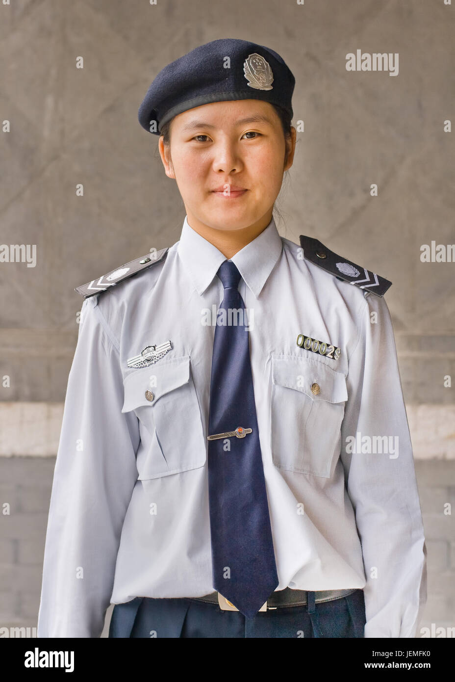 BEIJING-SEPTEMBER 28, 2012. Young female Police officer dressed in a ...