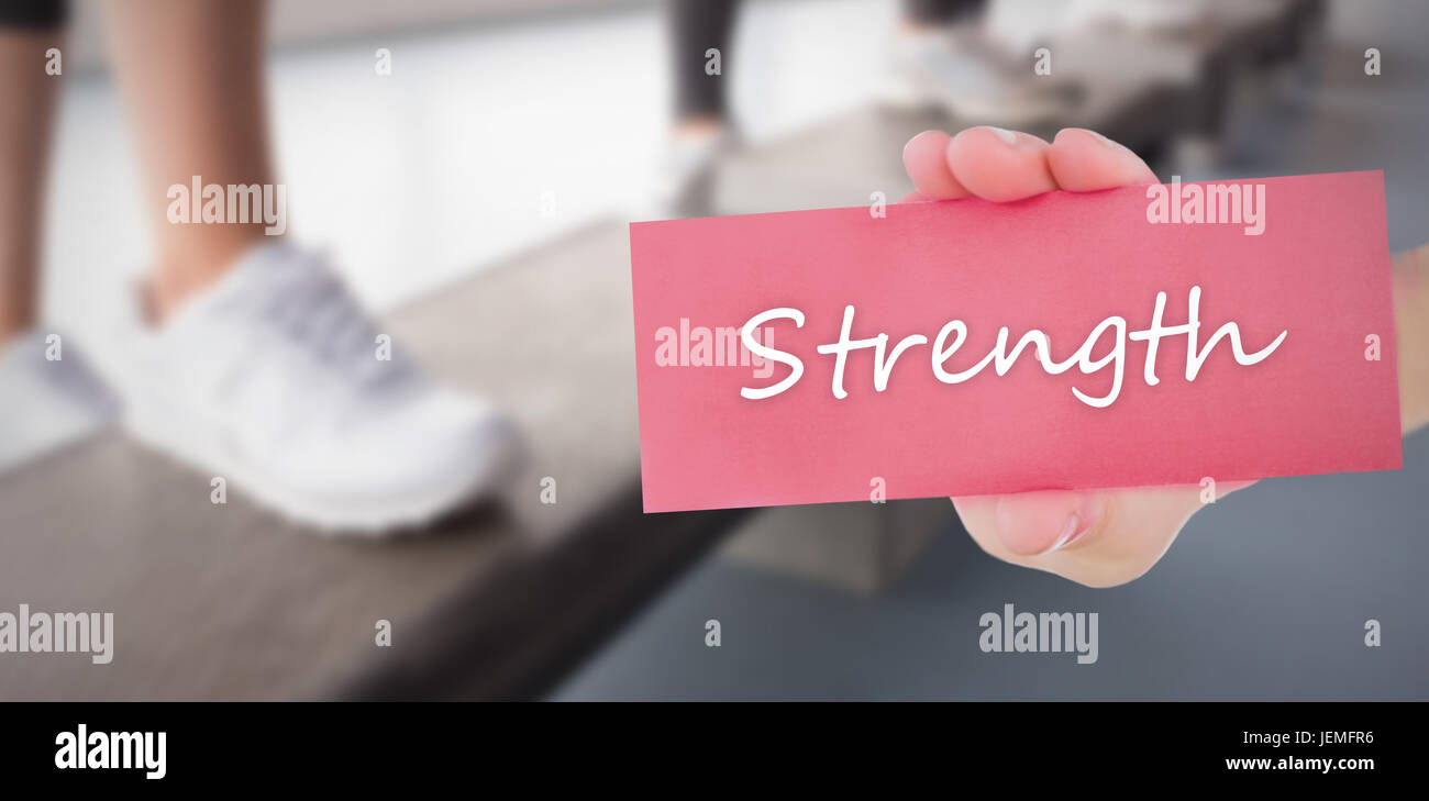 Strength against people background Stock Photo - Alamy