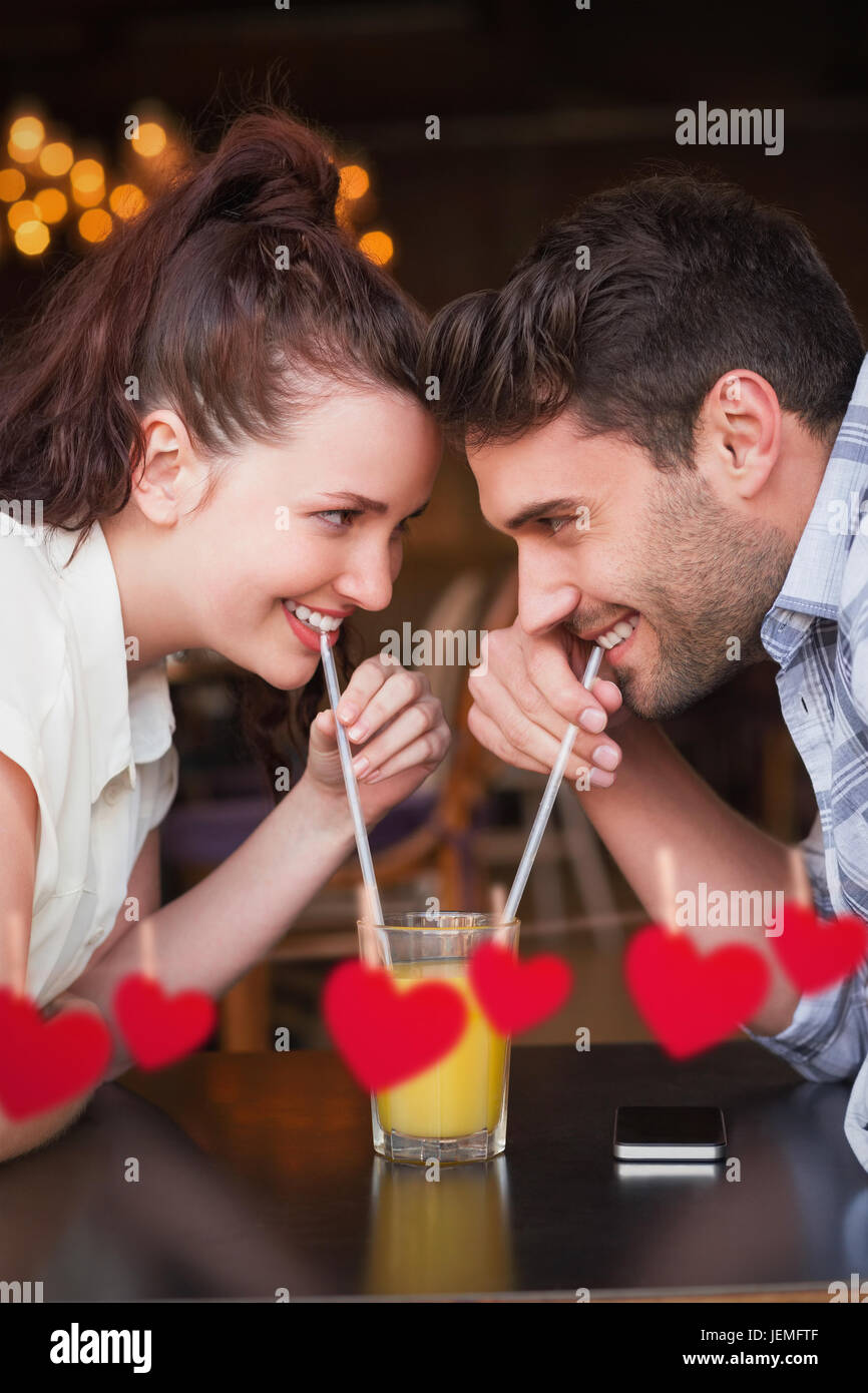 Composite image of cute couple on a date Stock Photo - Alamy