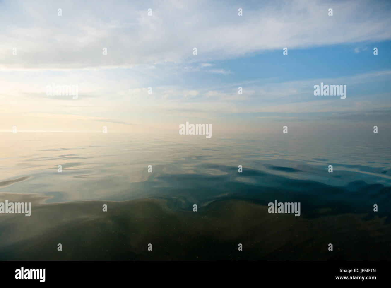 Water surface at evening Stock Photo - Alamy