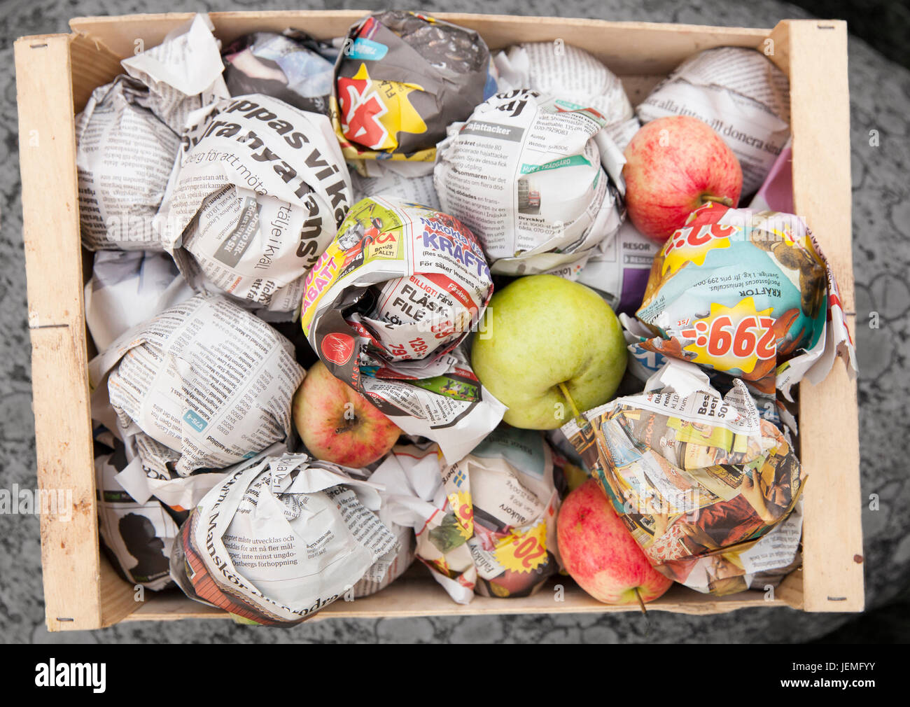 Wrapped newspaper hi-res stock photography and images - Alamy