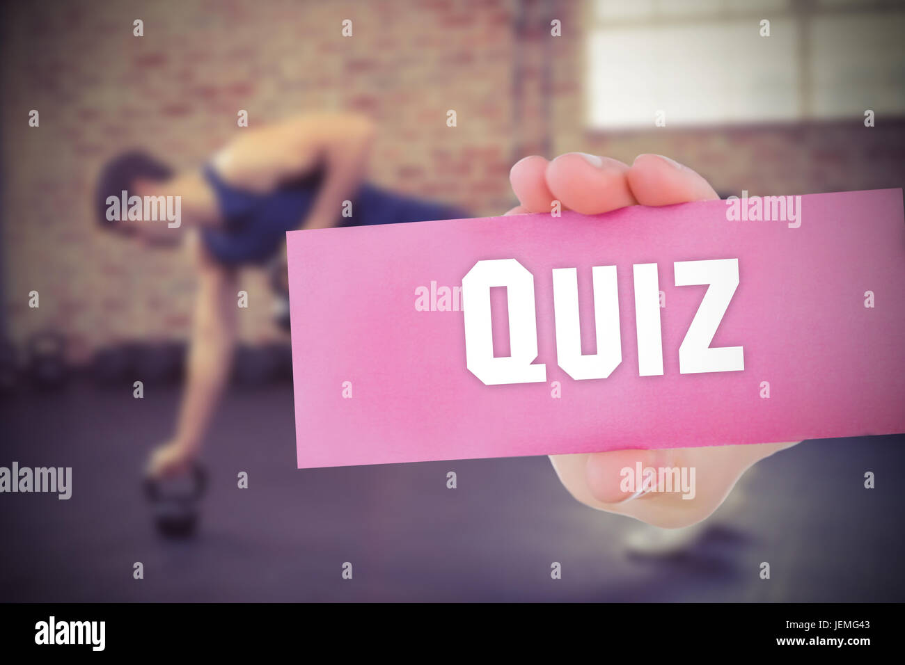 Quiz against people background Stock Photo - Alamy
