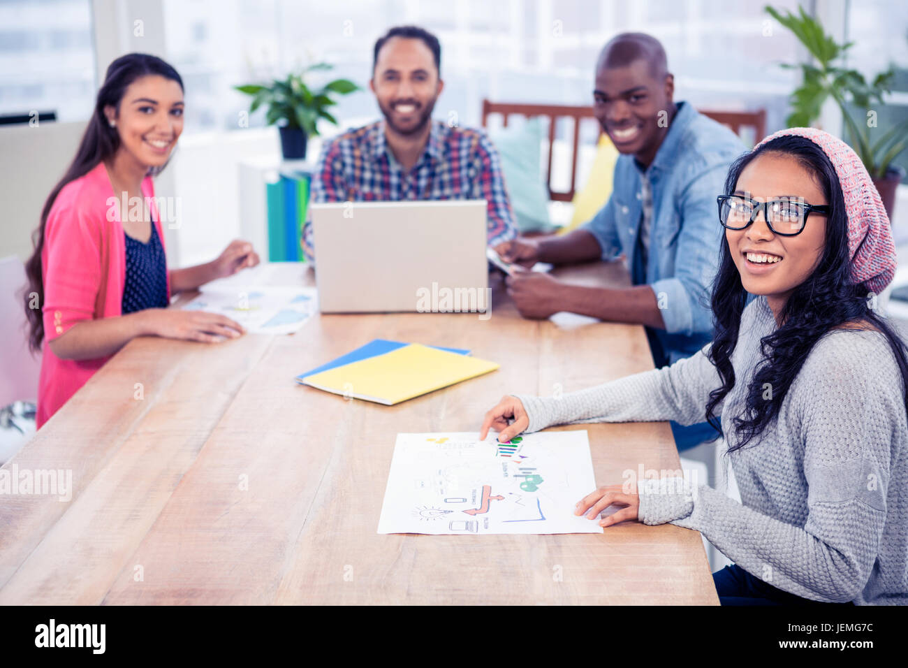 Portrait of happy business people at desk Stock Photo - Alamy