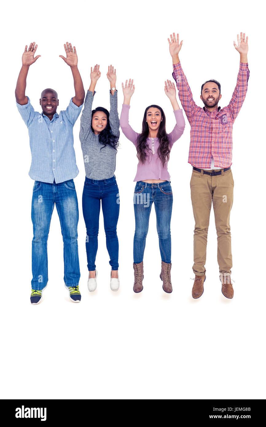 Young friends jumping together Cut Out Stock Images & Pictures - Alamy