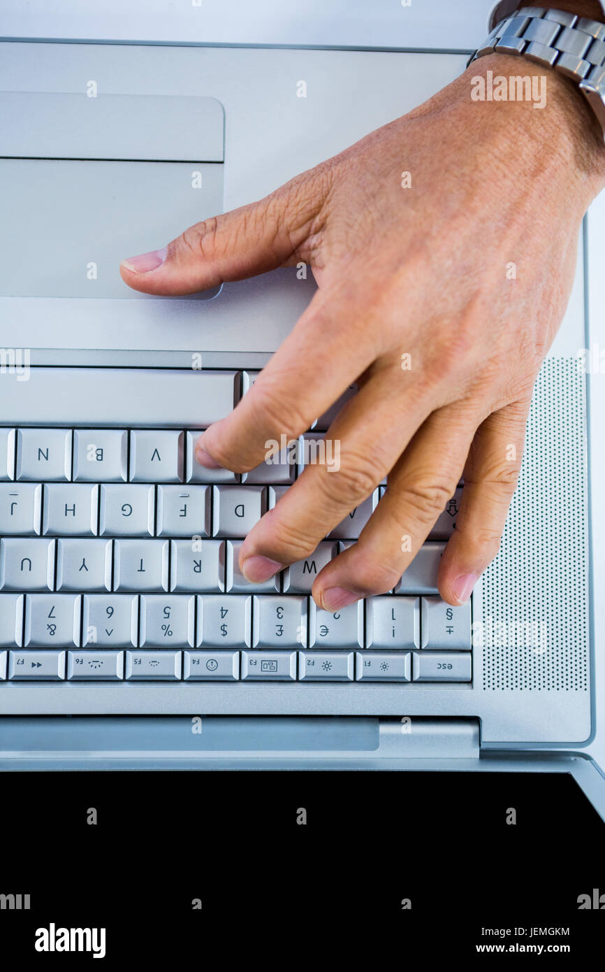 Businessman using his laptop Stock Photo - Alamy