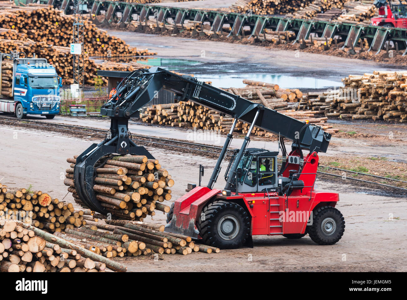 Logging vehicle carrying timber Stock Photo - Alamy