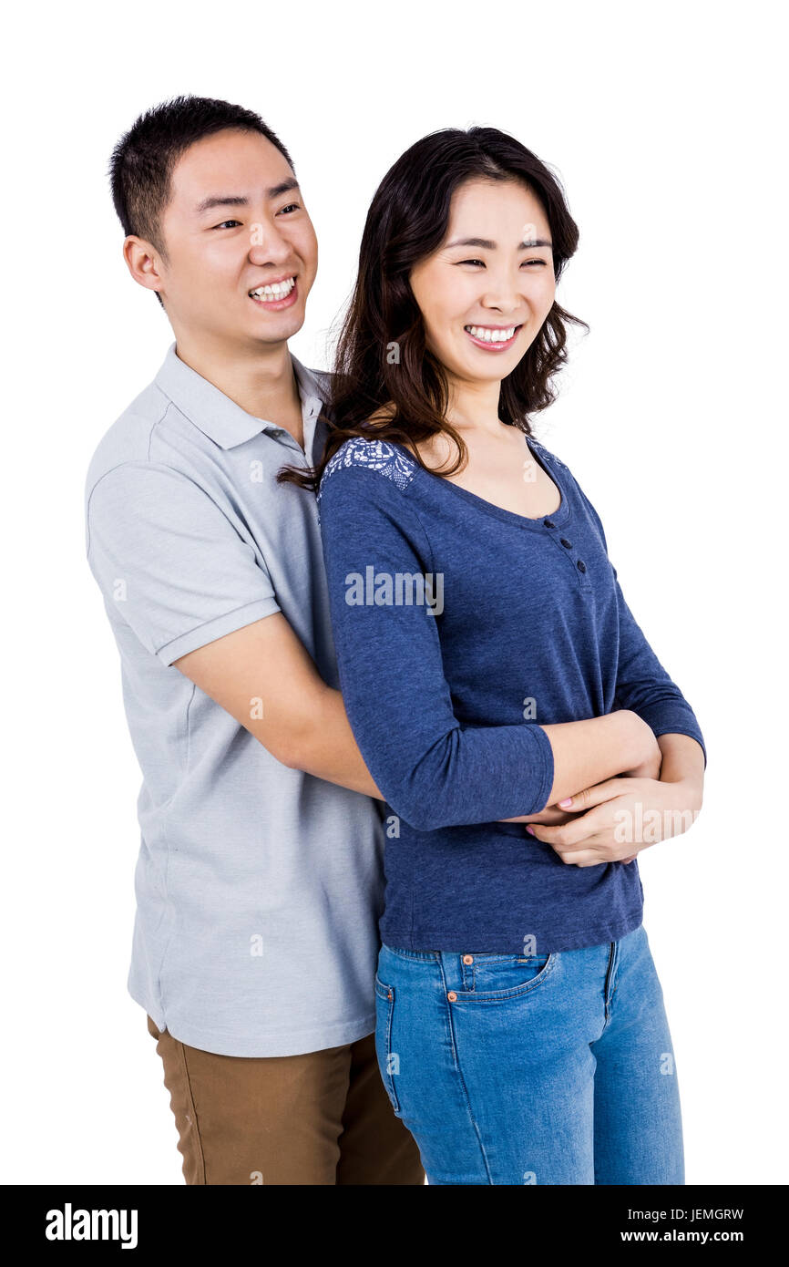 Man embracing woman Stock Photo - Alamy
