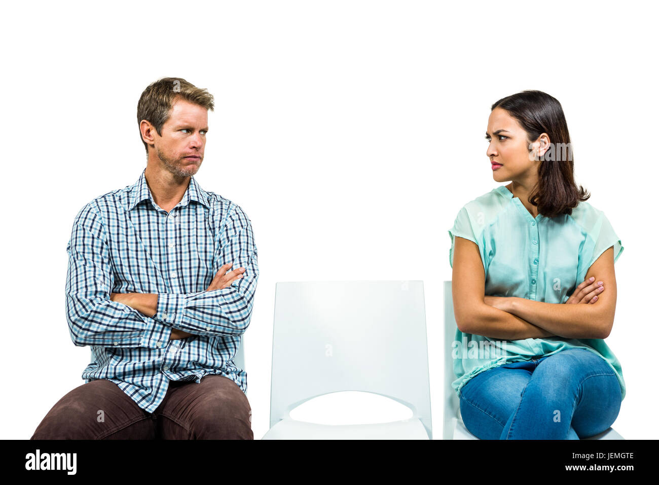 Angry couple looking at each other Stock Photo - Alamy