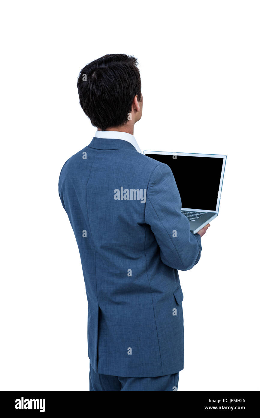 Businessman using his computer Stock Photo - Alamy