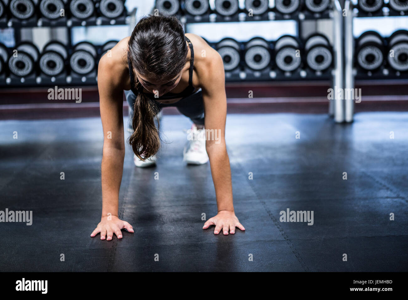 Fit woman doing push ups exercises Stock Photo - Alamy