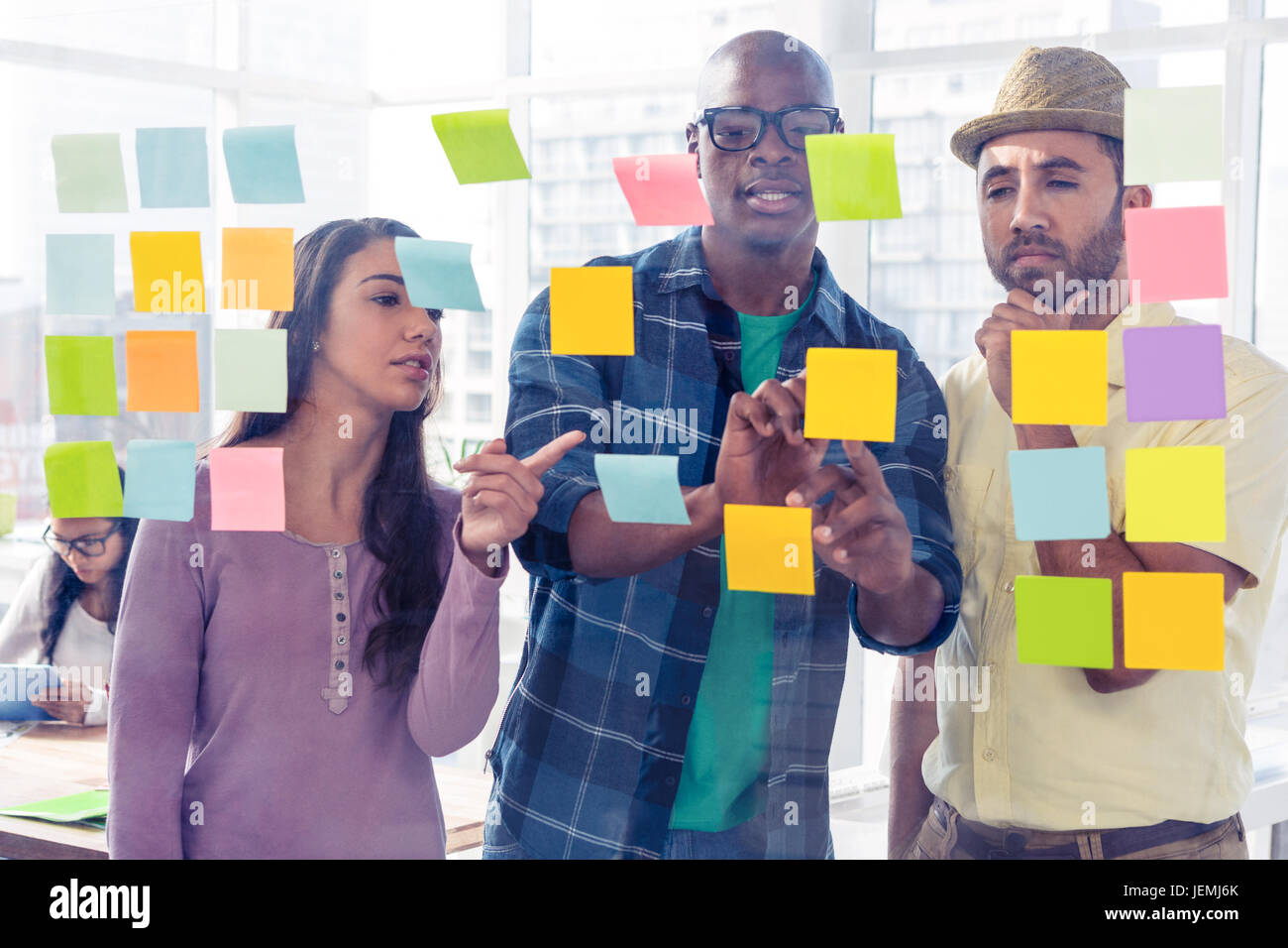 Business people planing over adhesive notes Stock Photo - Alamy