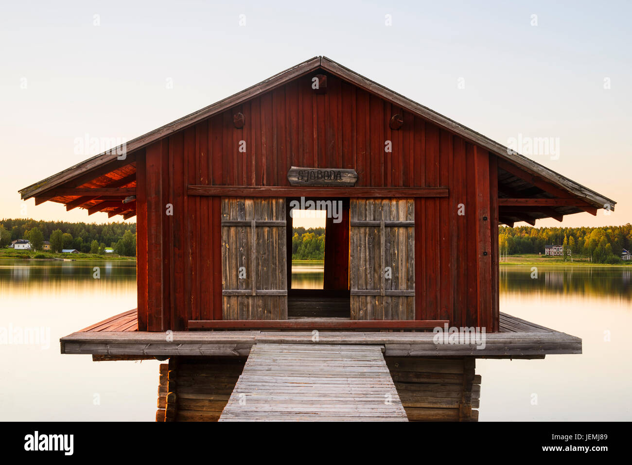 Wooden building at lake Stock Photo - Alamy