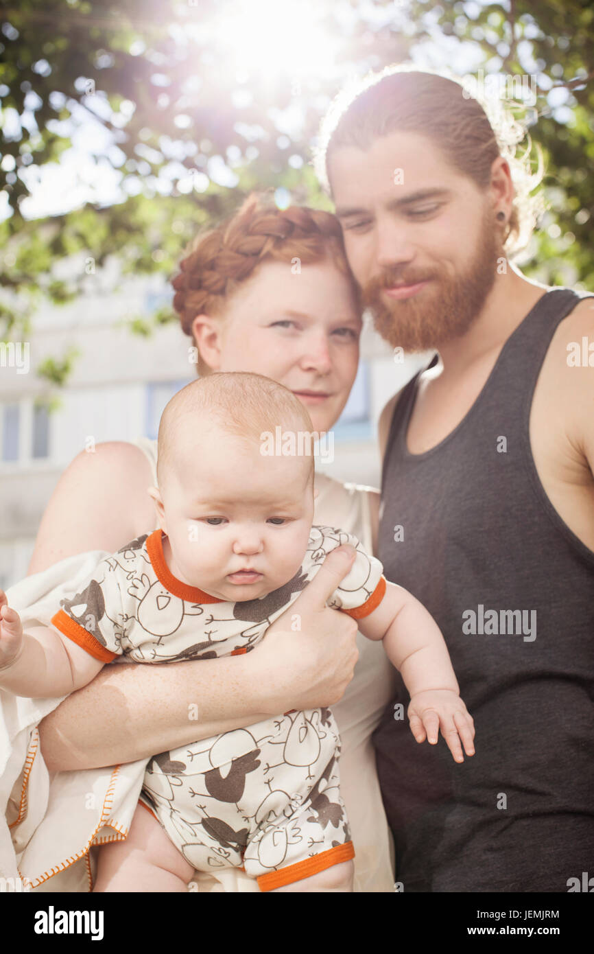 Young parents with baby Stock Photo - Alamy