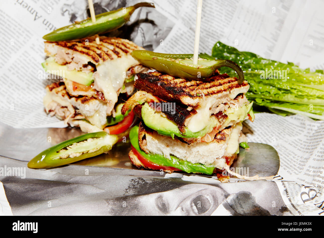 Grilled sandwiches on newspaper Stock Photo - Alamy