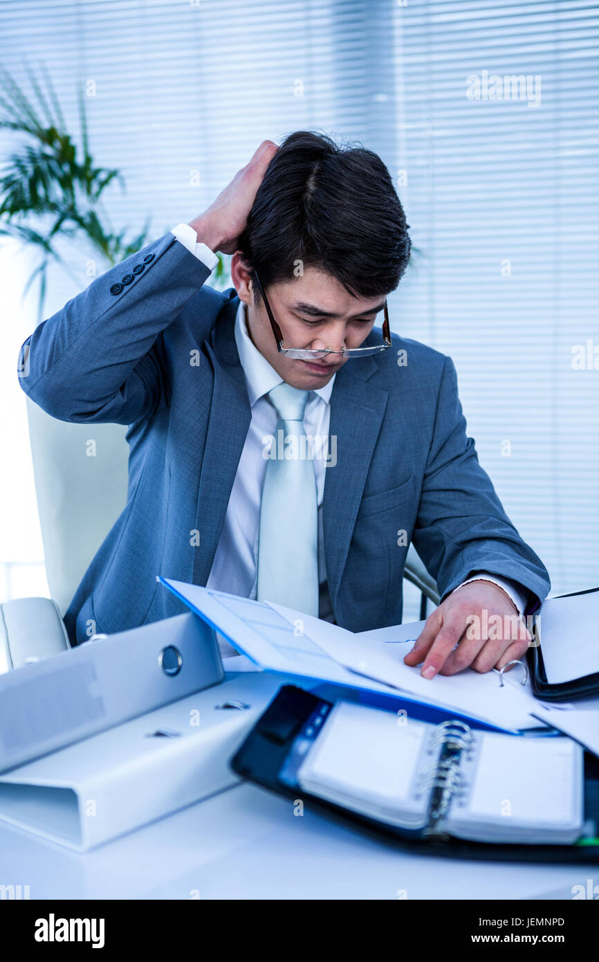 Busy asian businessman Stock Photo - Alamy