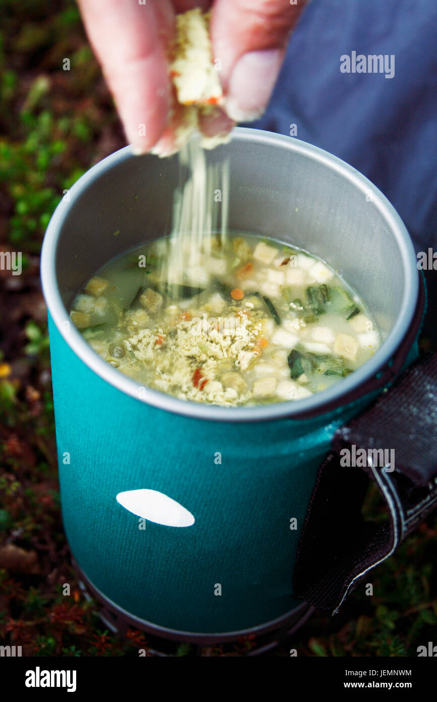 Preparing instant soup Stock Photo - Alamy