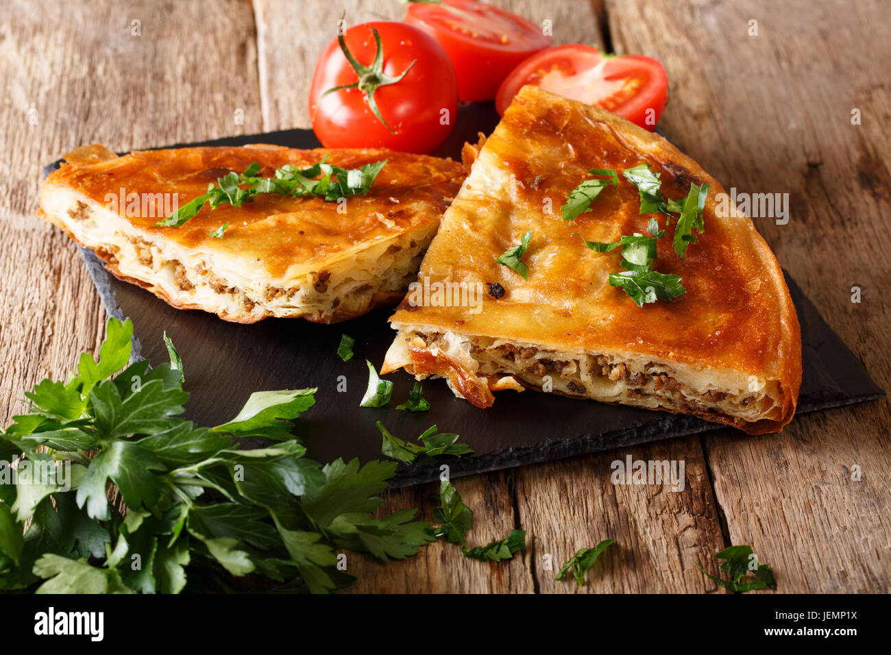 Tasty Turkish burek with meat close-up on table. Horizontal Stock Photo ...