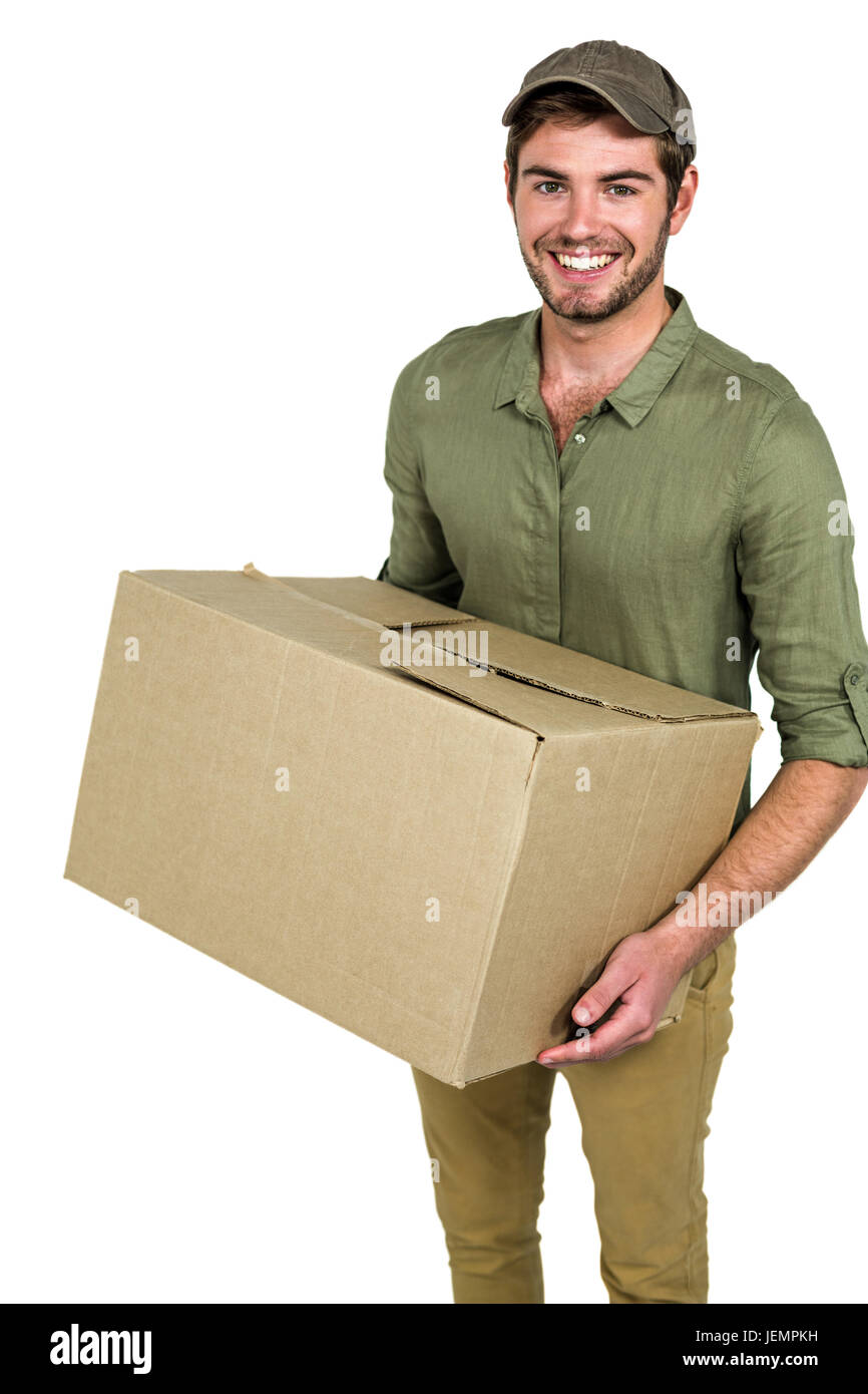 Smiling postman holding package Stock Photo - Alamy