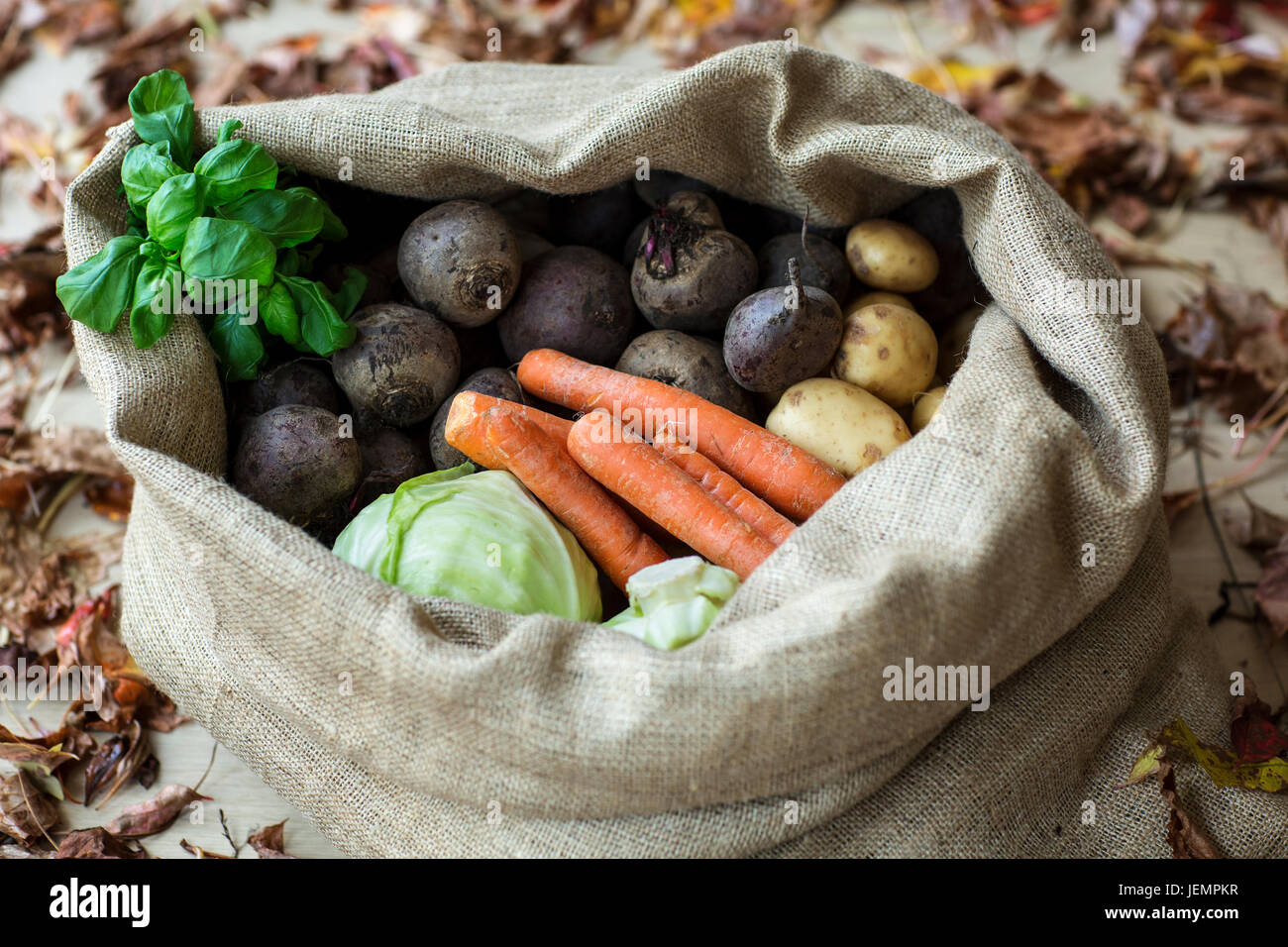 Root vegetables in sack Stock Photo - Alamy
