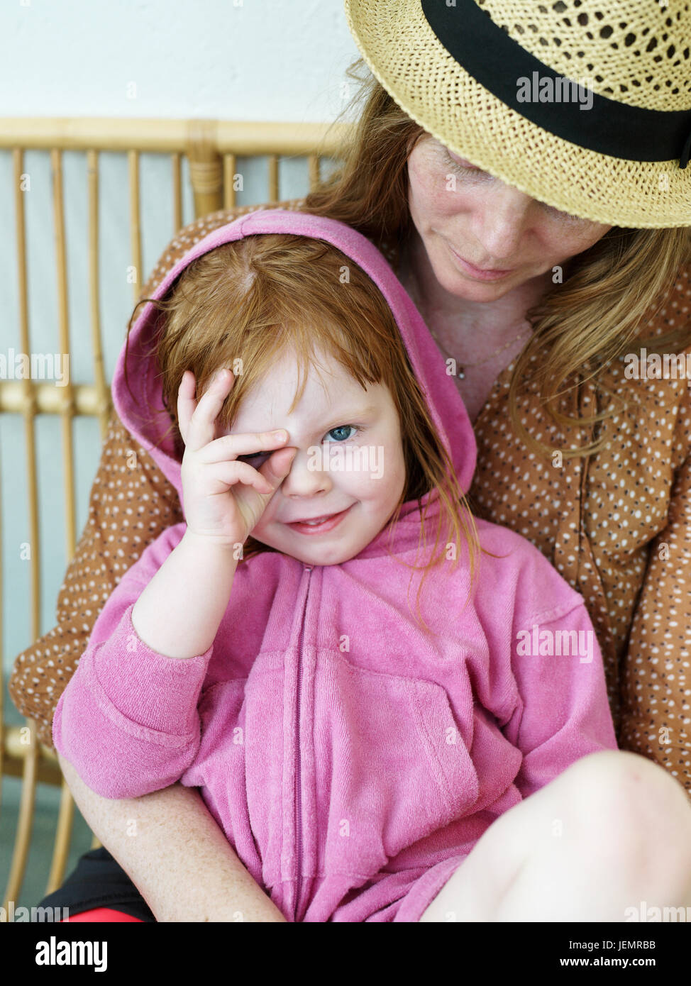 Girl sitting on mothers lap Stock Photo - Alamy Girl sitting on mothers lap Stock Photo - Alamy
