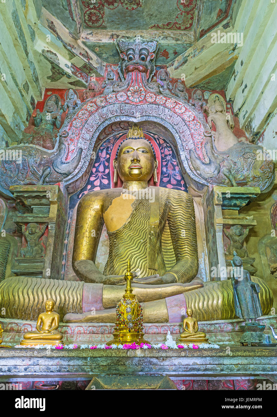 PILIMATHALAWA, SRI LANKA - NOVEMBER 11, 2016: The golden statue of Lord ...