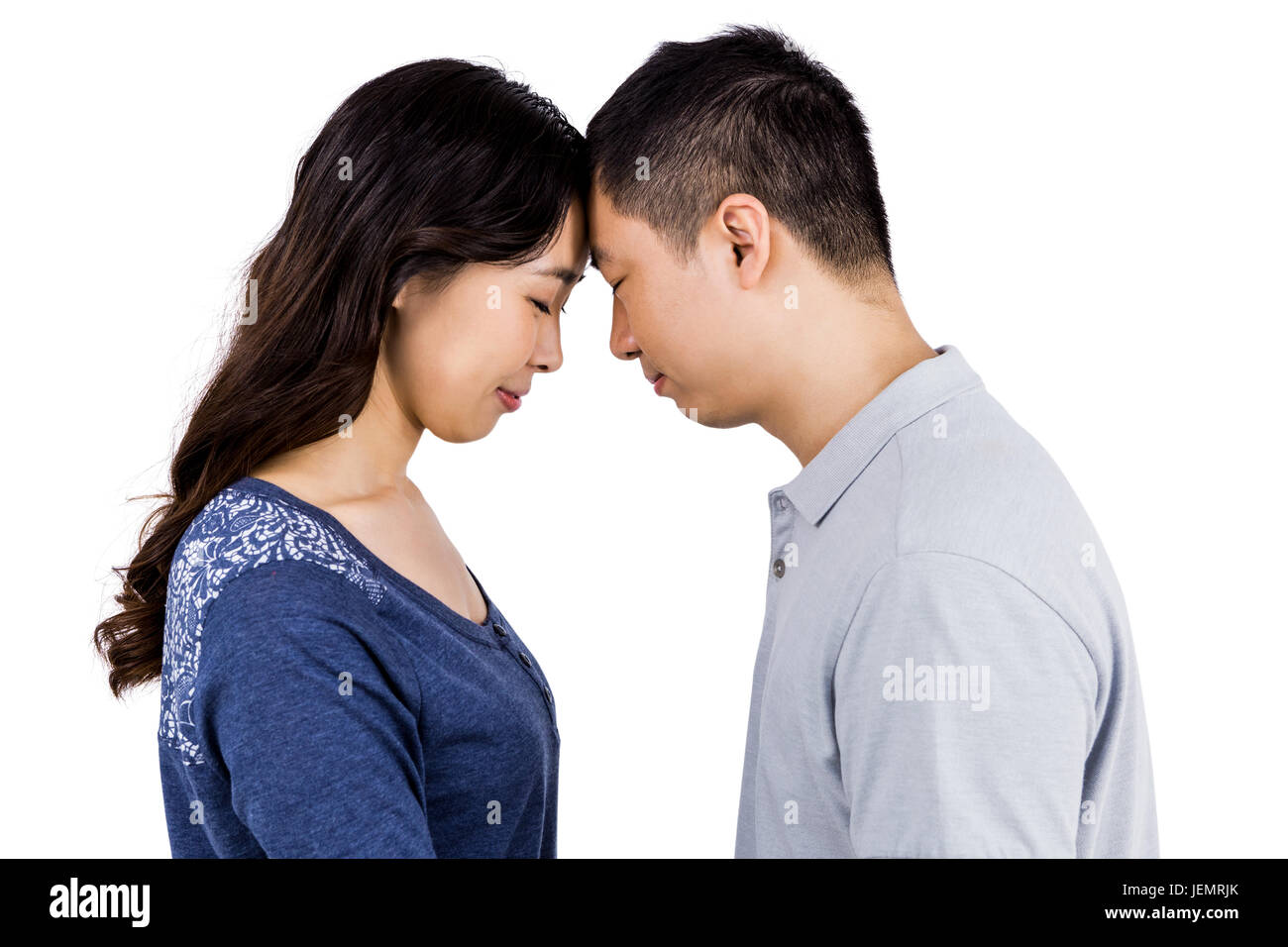 Loving couple head to head Stock Photo - Alamy