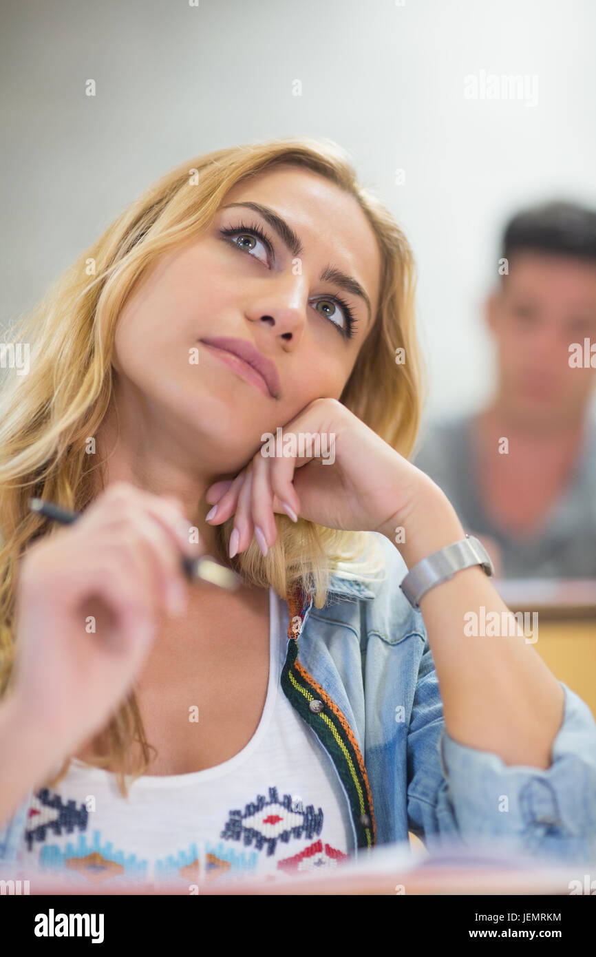 Thoughtful female student sitting hi-res stock photography and images ...