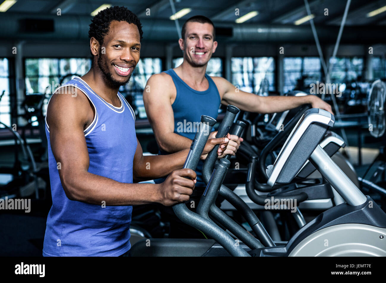 Two men working out together Stock Photo - Alamy