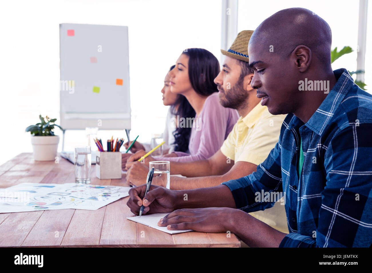 Colleagues sitting in conference room Stock Photo - Alamy