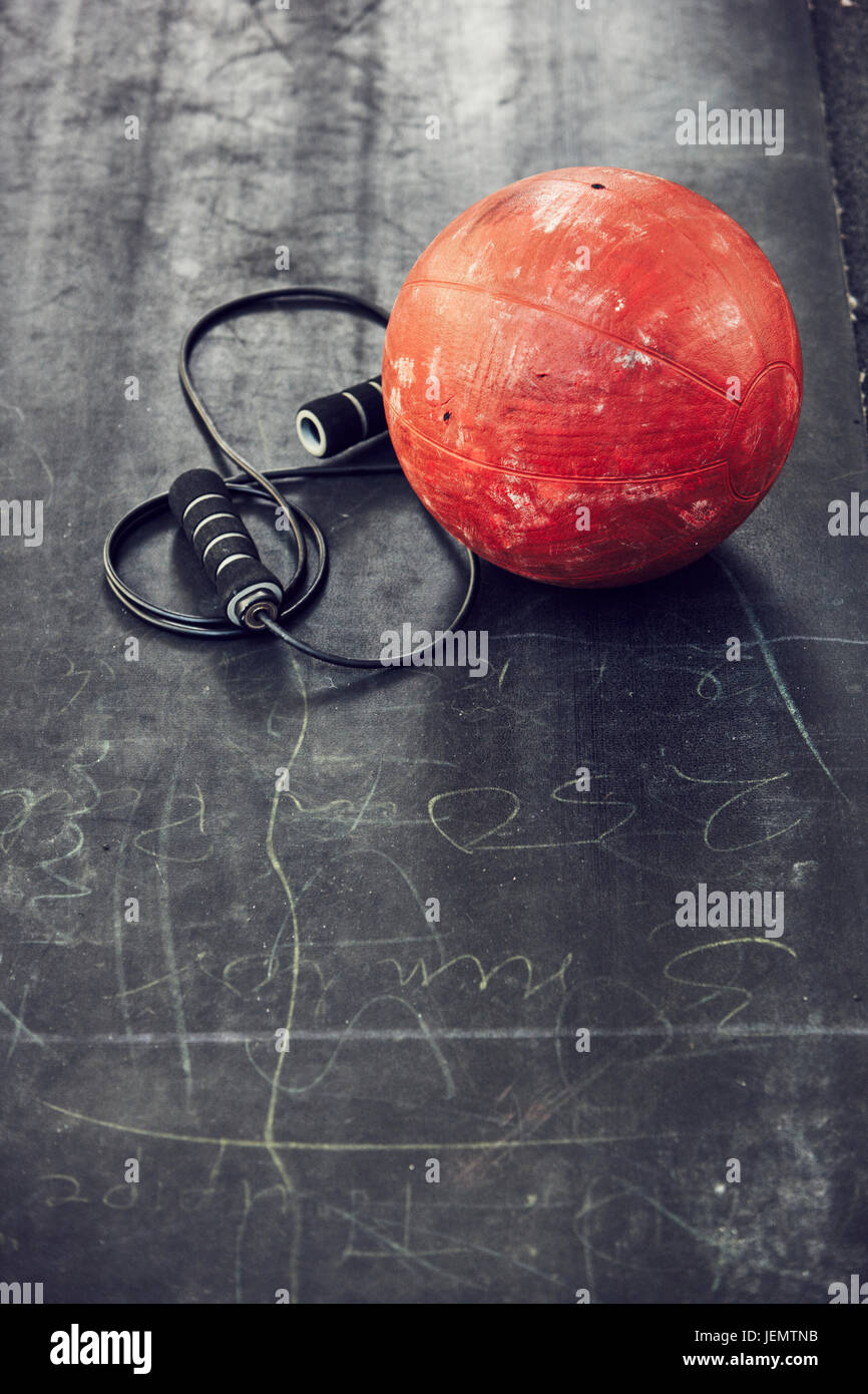 Ball and skipping rope in gym Stock Photo - Alamy
