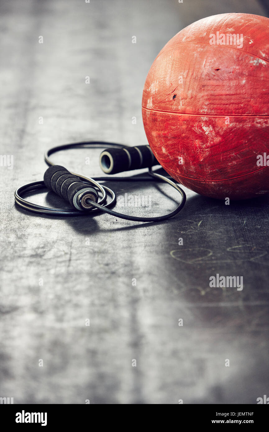 Ball and skipping rope in gym Stock Photo - Alamy