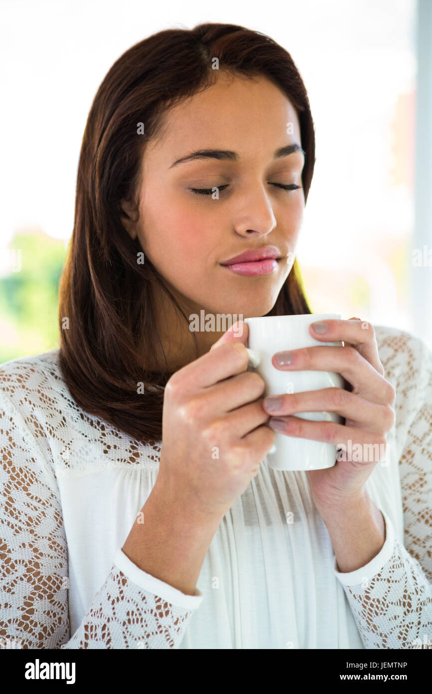 Young girl drink her tea Stock Photo - Alamy