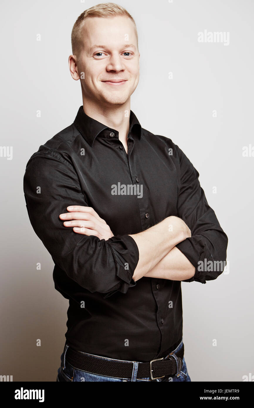 Portrait of young man, studio shot Stock Photo - Alamy