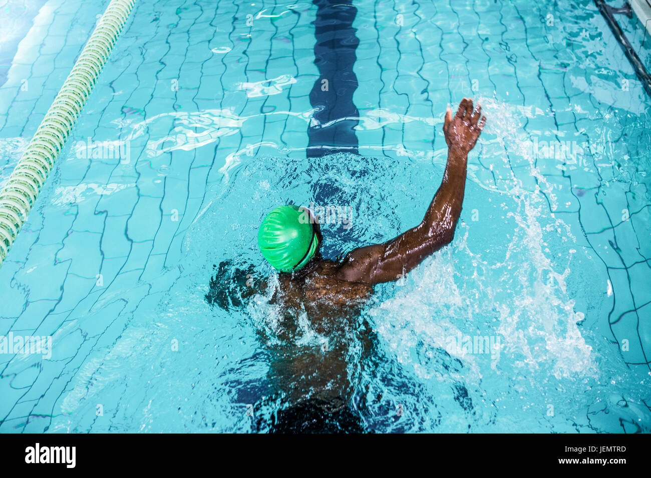 Fit man swimming in the pool Stock Photo - Alamy