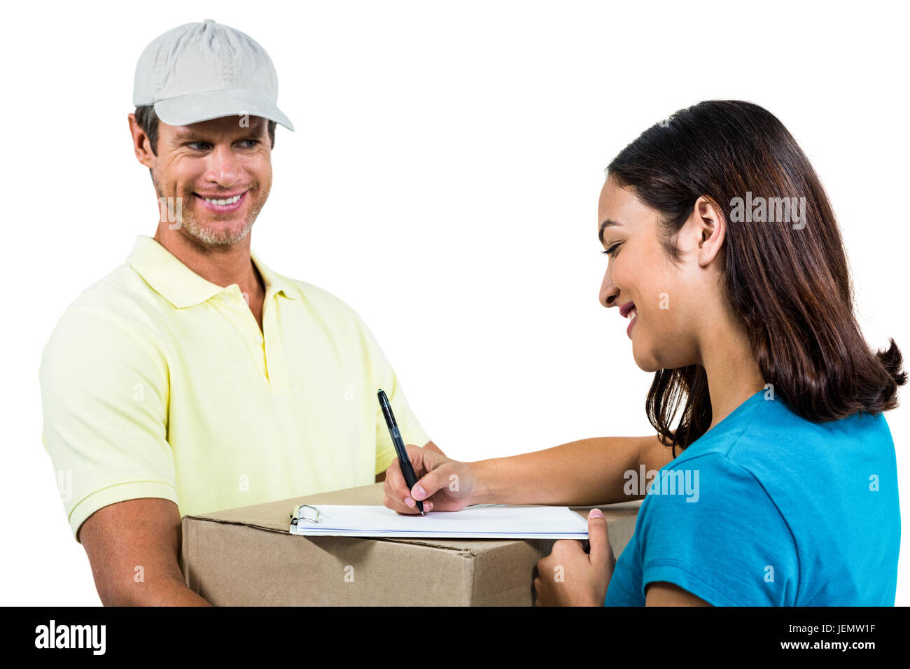 Cheerful delivery man with customer Stock Photo - Alamy