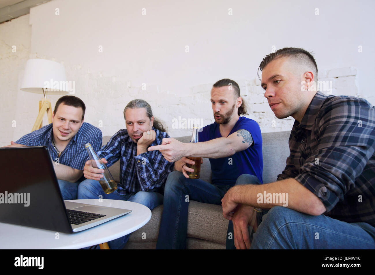 Football laptop fans watching hi-res stock photography and images - Alamy