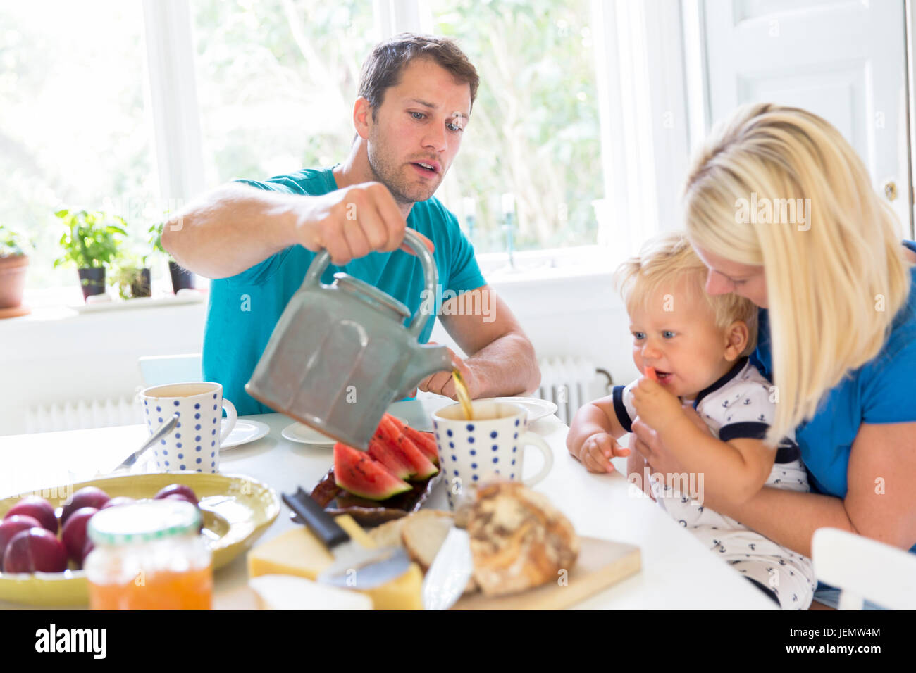 Family having breakfast Stock Photo - Alamy