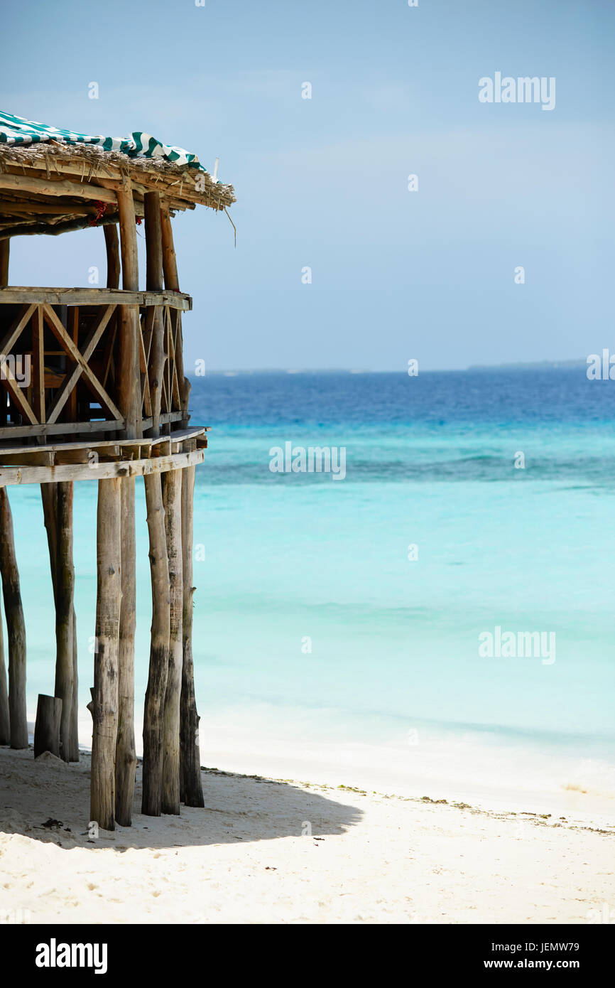Wooden building on tropical beach Stock Photo - Alamy