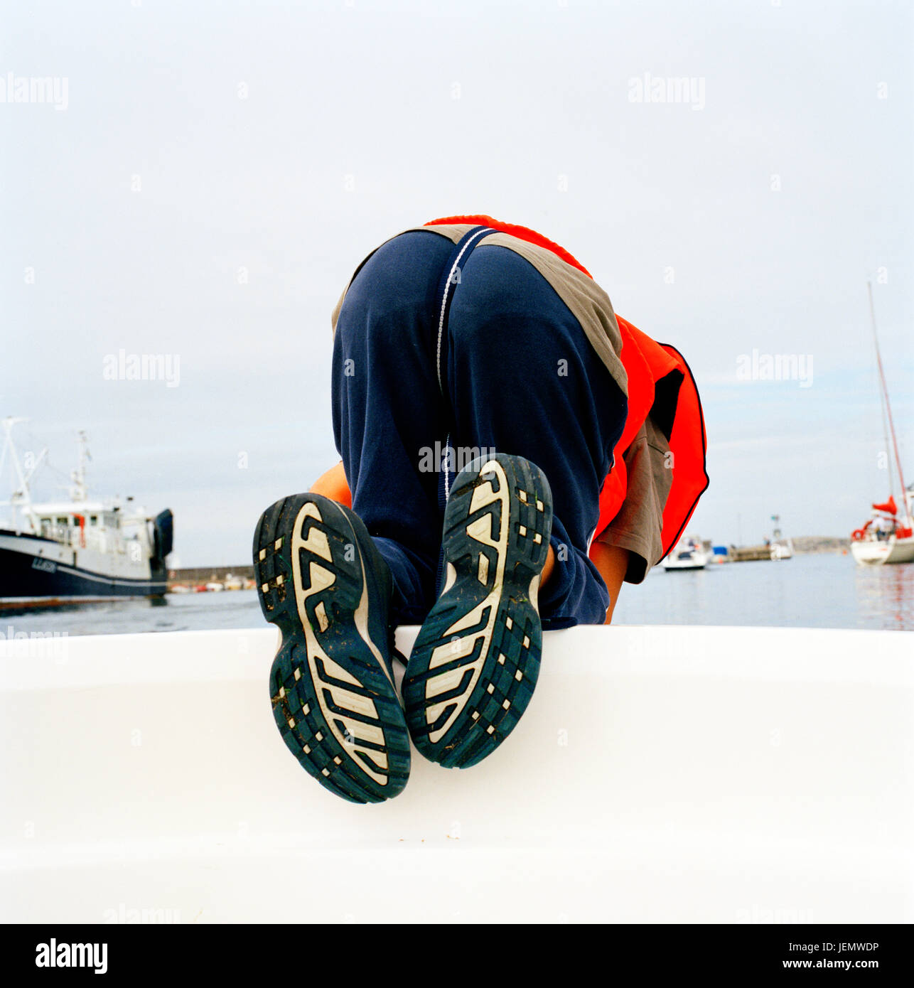 Person on boat, rear view Stock Photo - Alamy