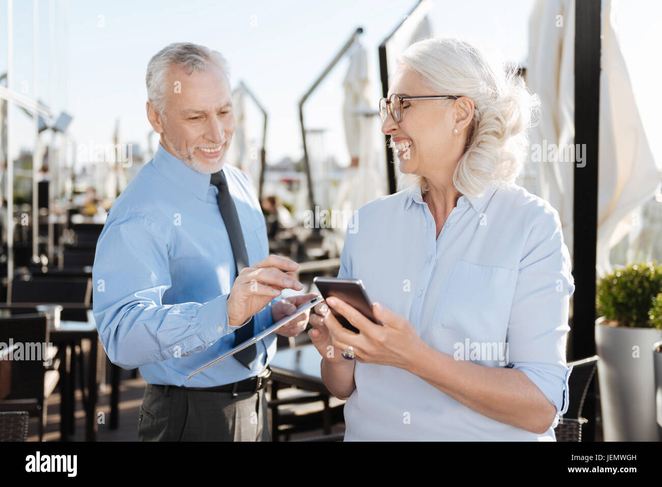 Two colleagues having fun during break Stock Photo - Alamy